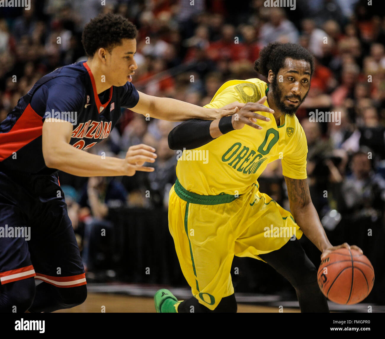 Las Vegas, NV, USA. 11th Mar, 2016. Oregon F # 0 Dwayne Benjamin scored ...