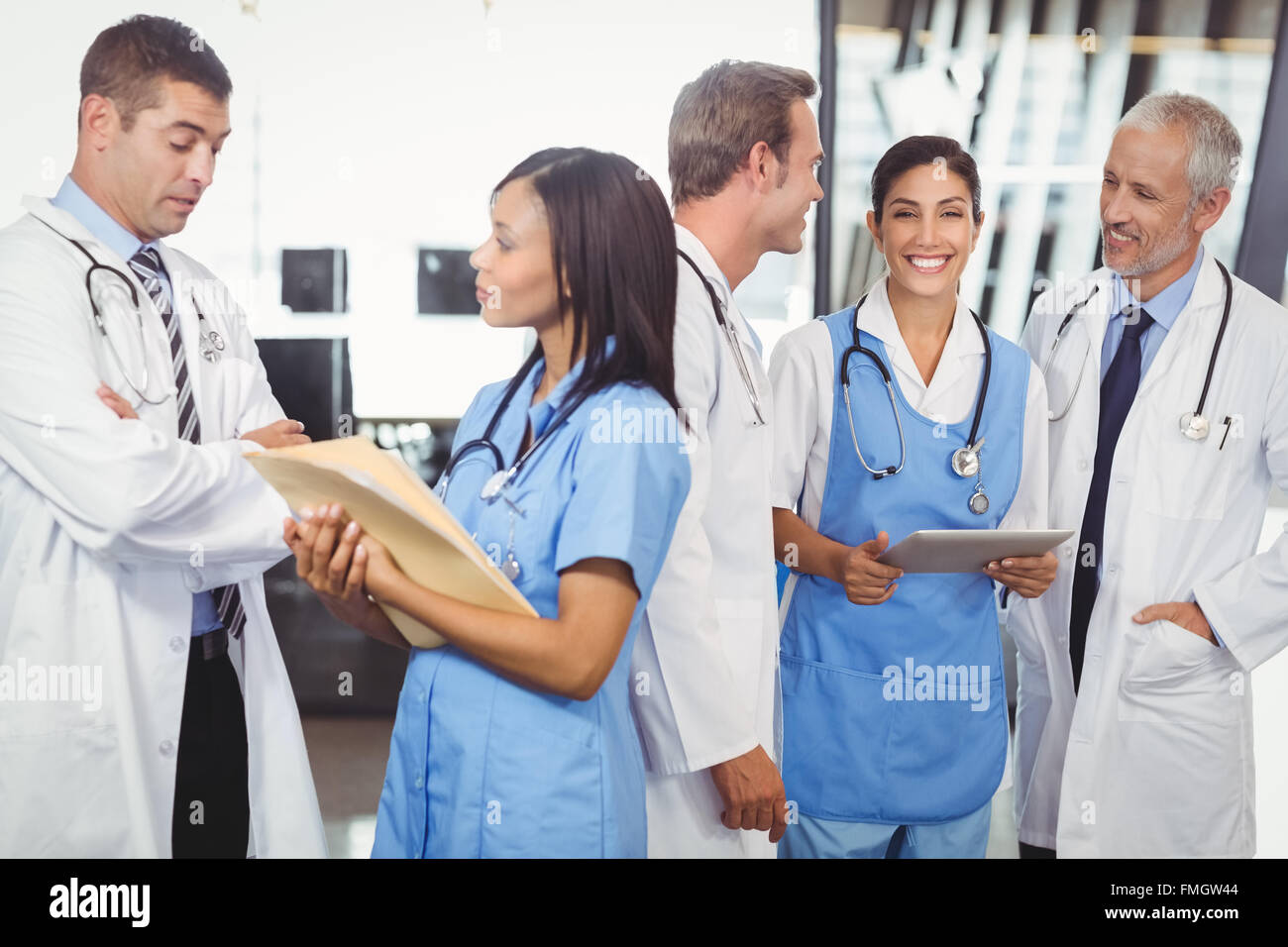 Medical team interacting with each other Stock Photo - Alamy