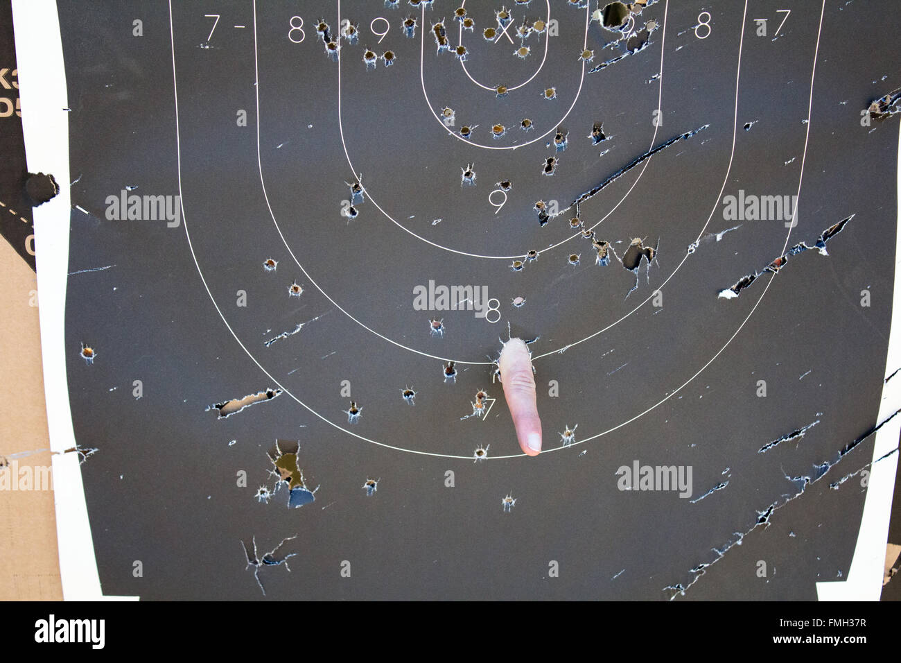 shooting target with bullet holes Stock Photo - Alamy