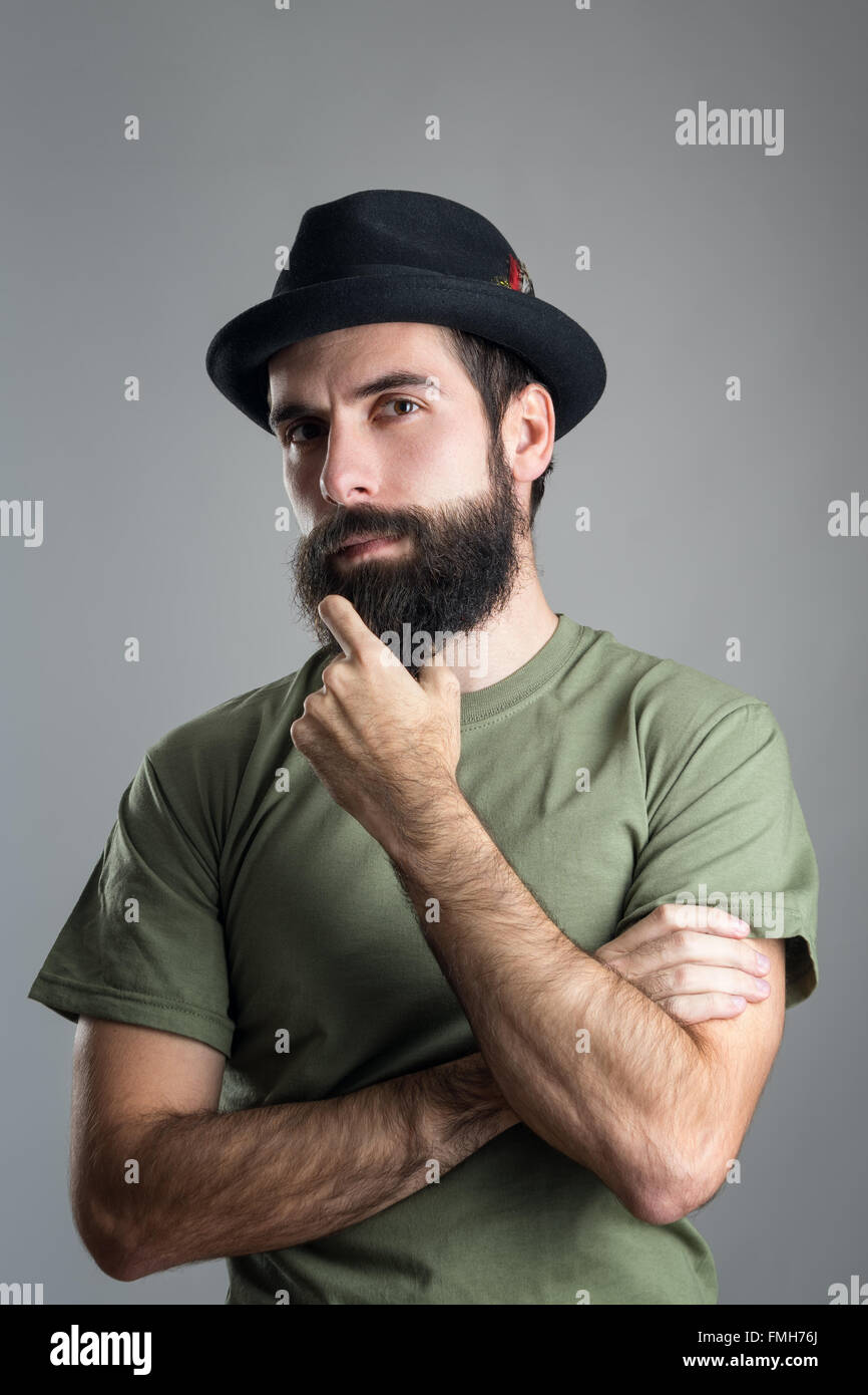 Man stroking beard portrait hi-res stock photography and images - Alamy