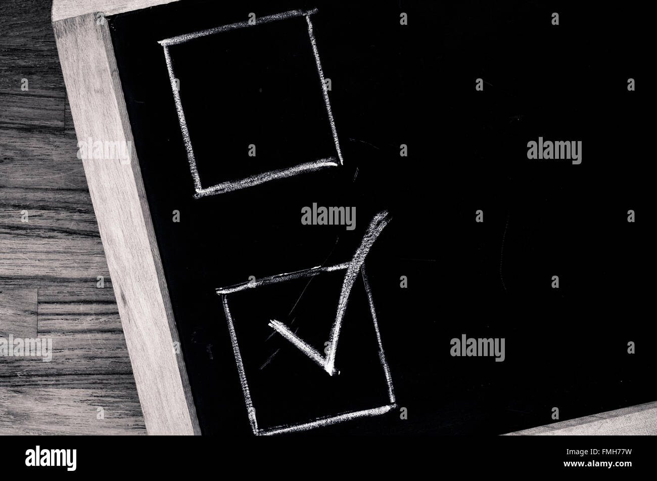 check boxes and text on a blackboard surface - black and white Stock ...