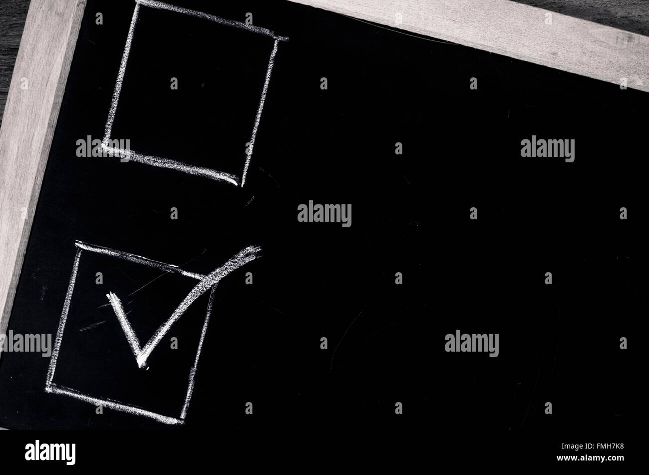 check boxes and text on a blackboard surface - black and white Stock ...