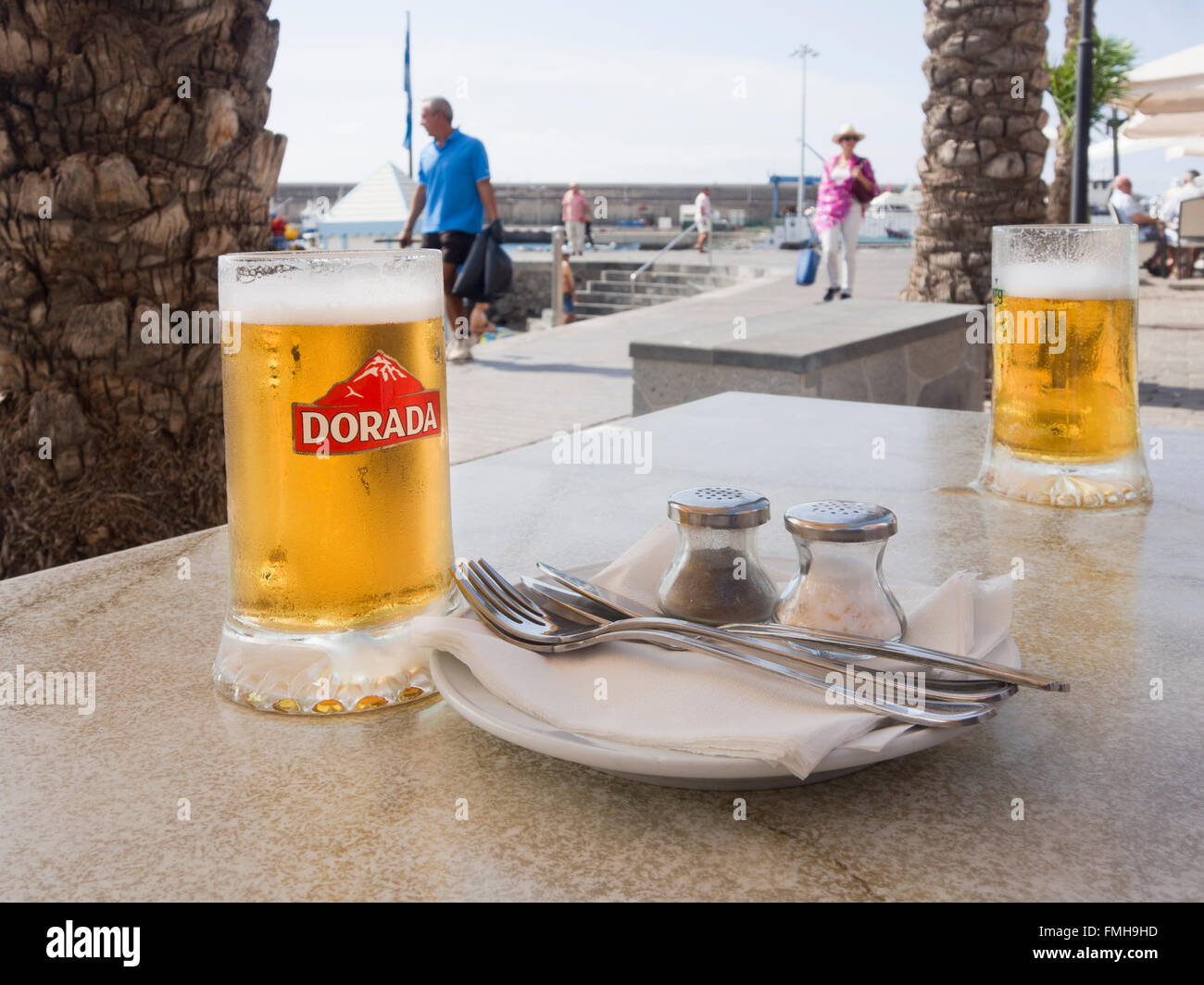 A mug of Dorada beer while waiting for the food to arrive, outdoors ...