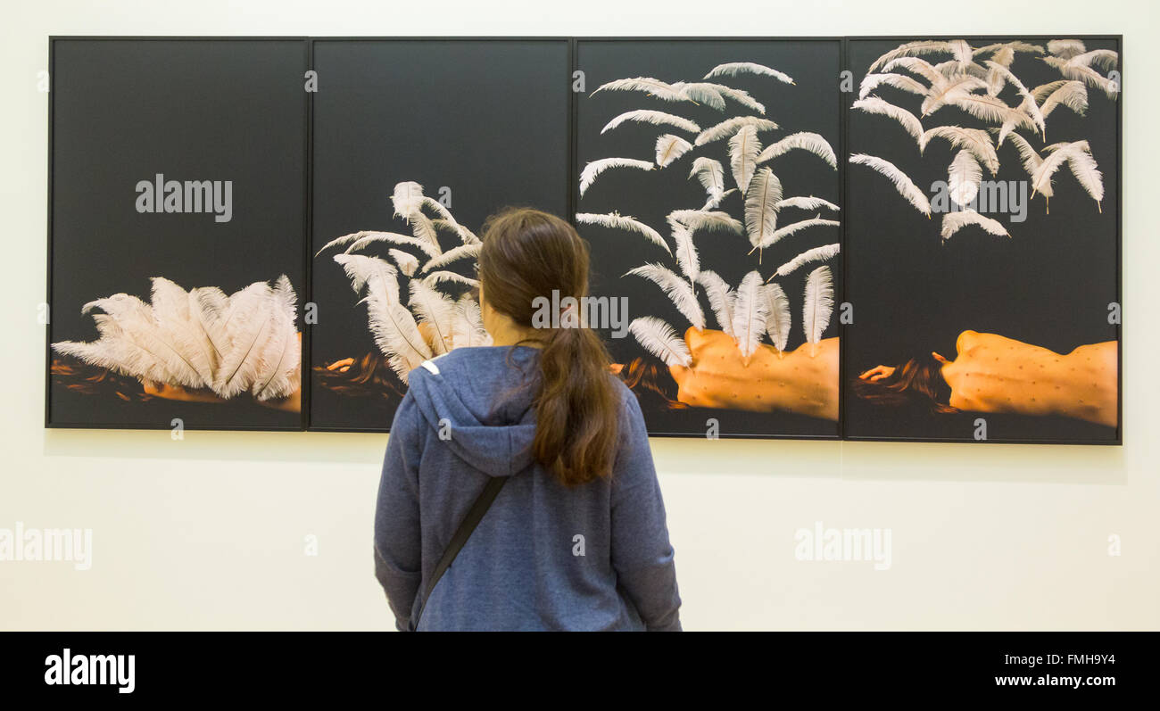 young girl observed an abstract painting Stock Photo - Alamy