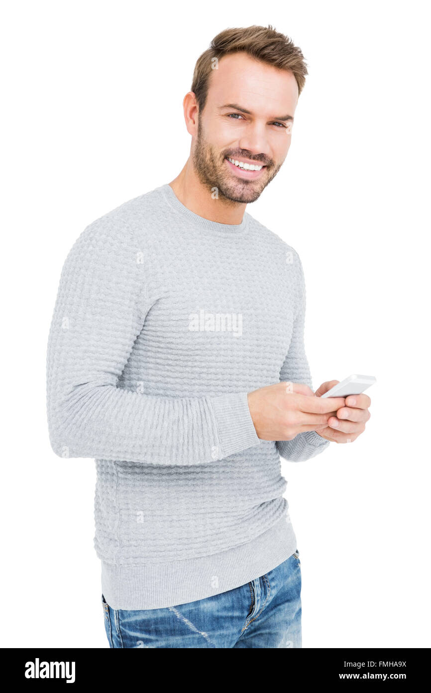 Young man using mobile phone Stock Photo - Alamy
