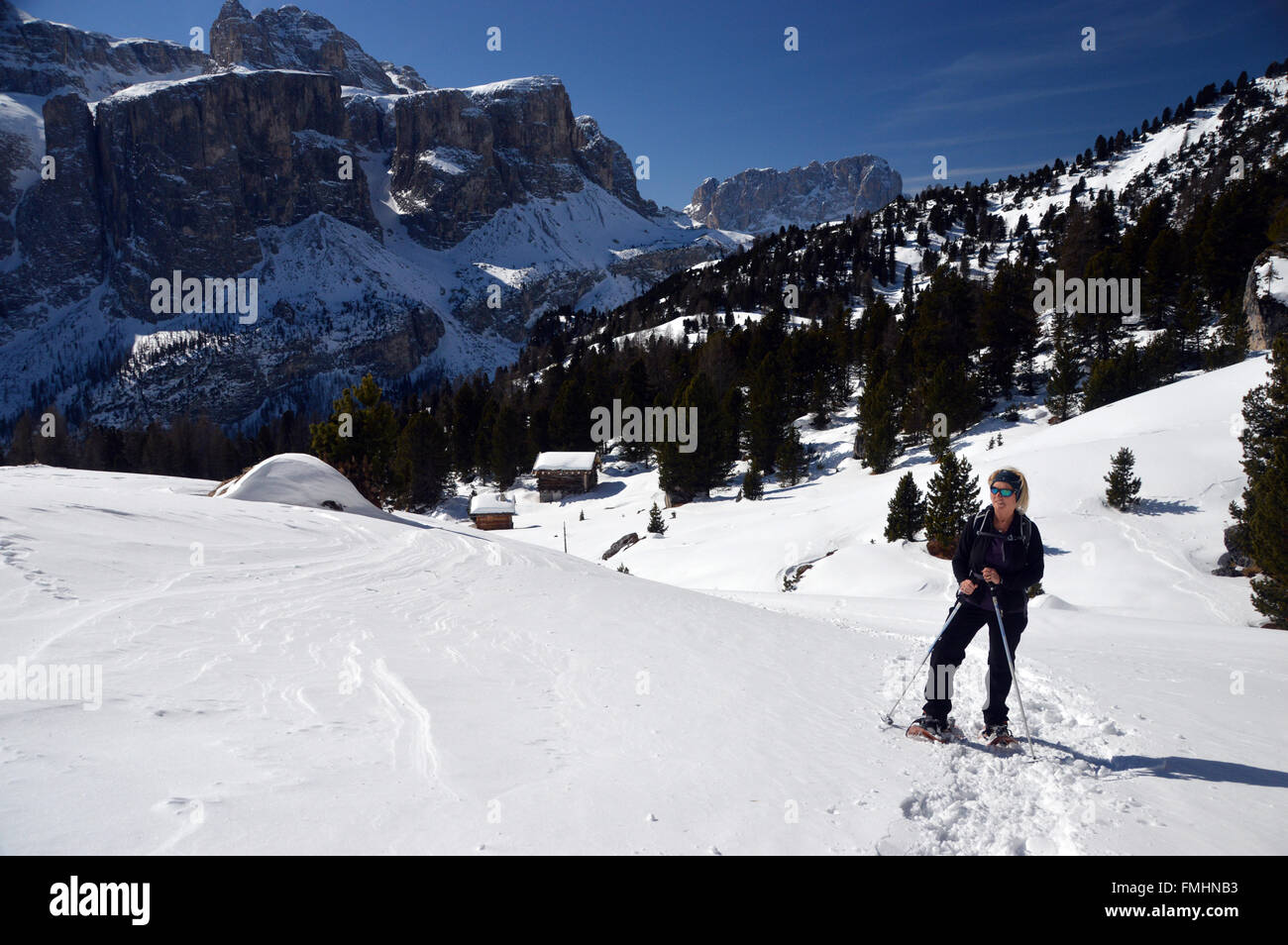 Lady Snow Shoeing in the Mountains near Corvara Italian Dolomites Stock ...