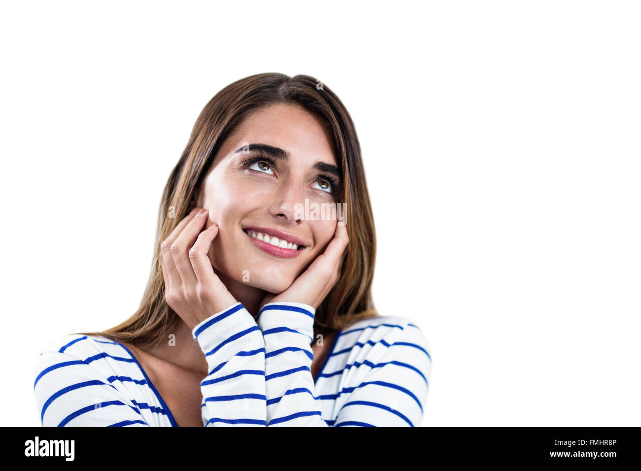 Smiling thoughtful young woman Stock Photo - Alamy