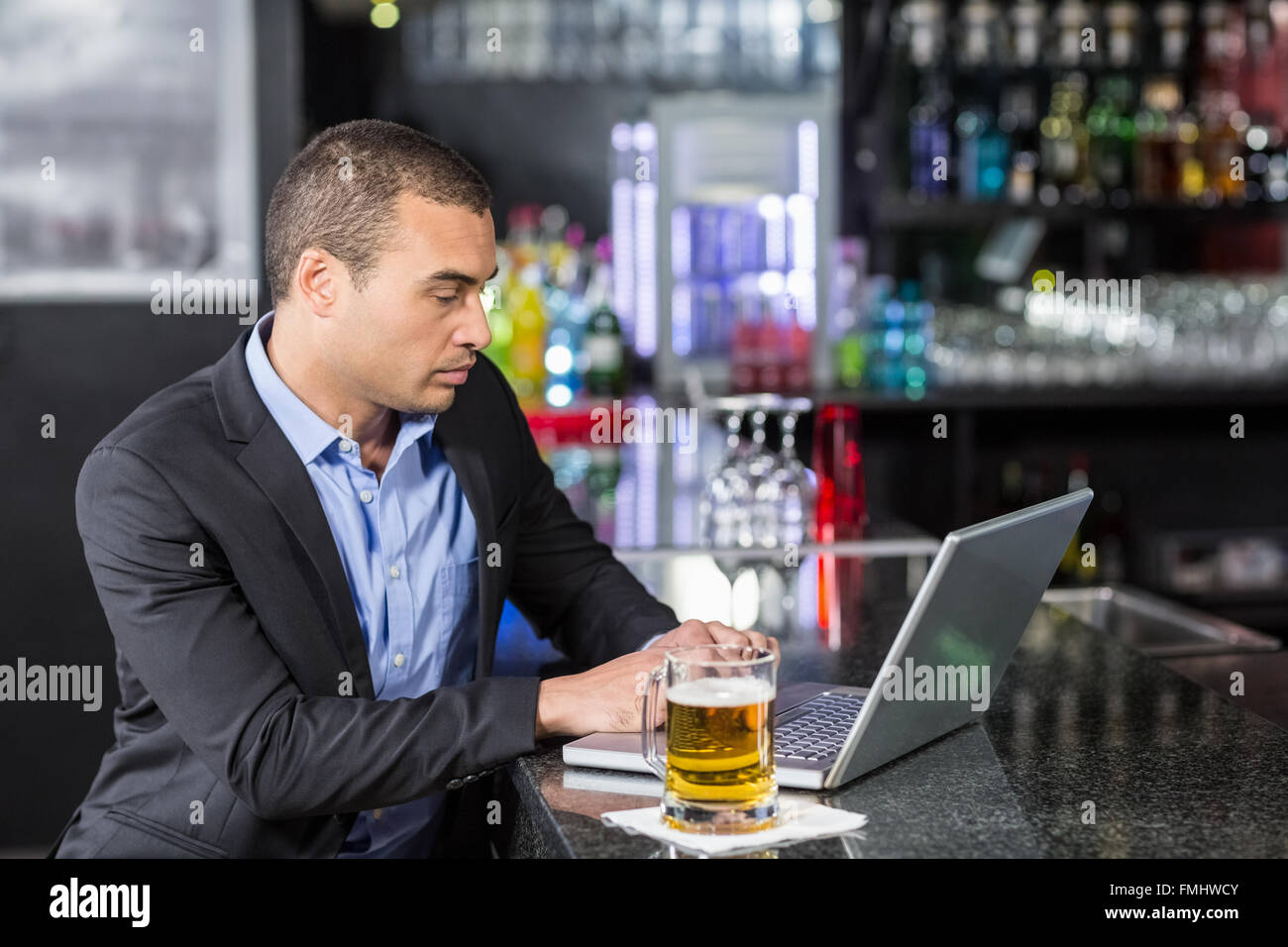 Businessman using his laptop Stock Photo - Alamy Businessman using his laptop Stock Photo - Alamy