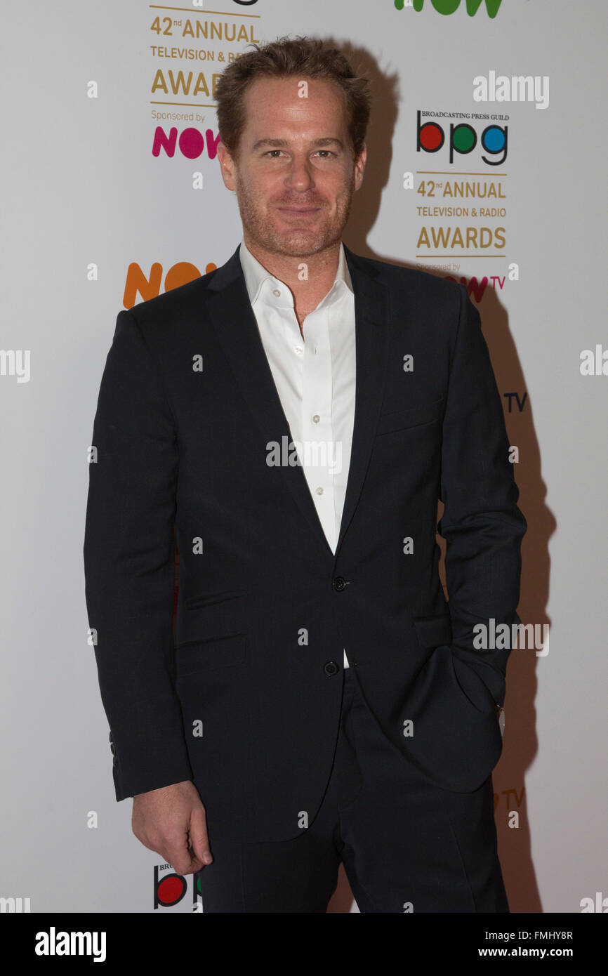 London, UK. 11 March 2016. Actor Adam James. Celebrities red carpet ...