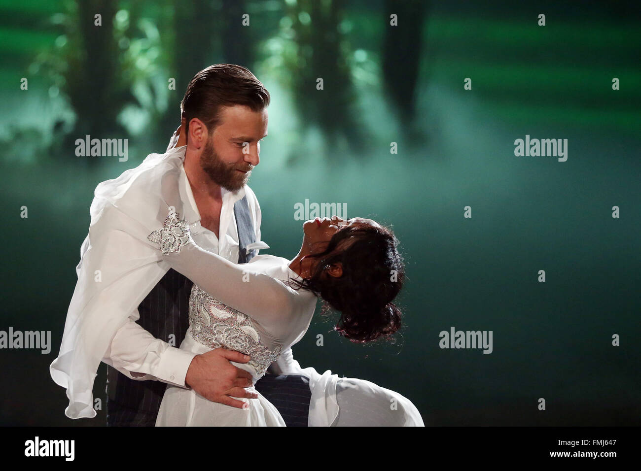 Cologne, Germany. 11th Mar, 2016. Niels Ruf and professional dancer Oti ...