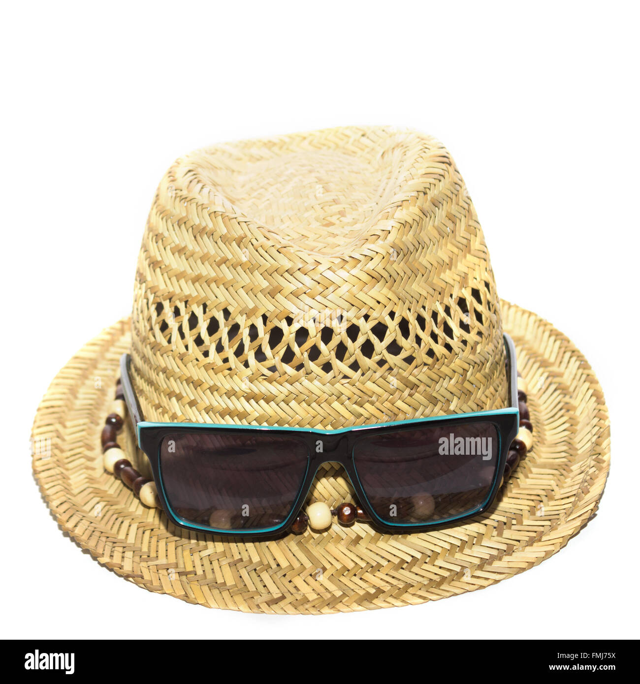 Hat sunglasses on yellow Cut Out Stock Images & Pictures - Alamy