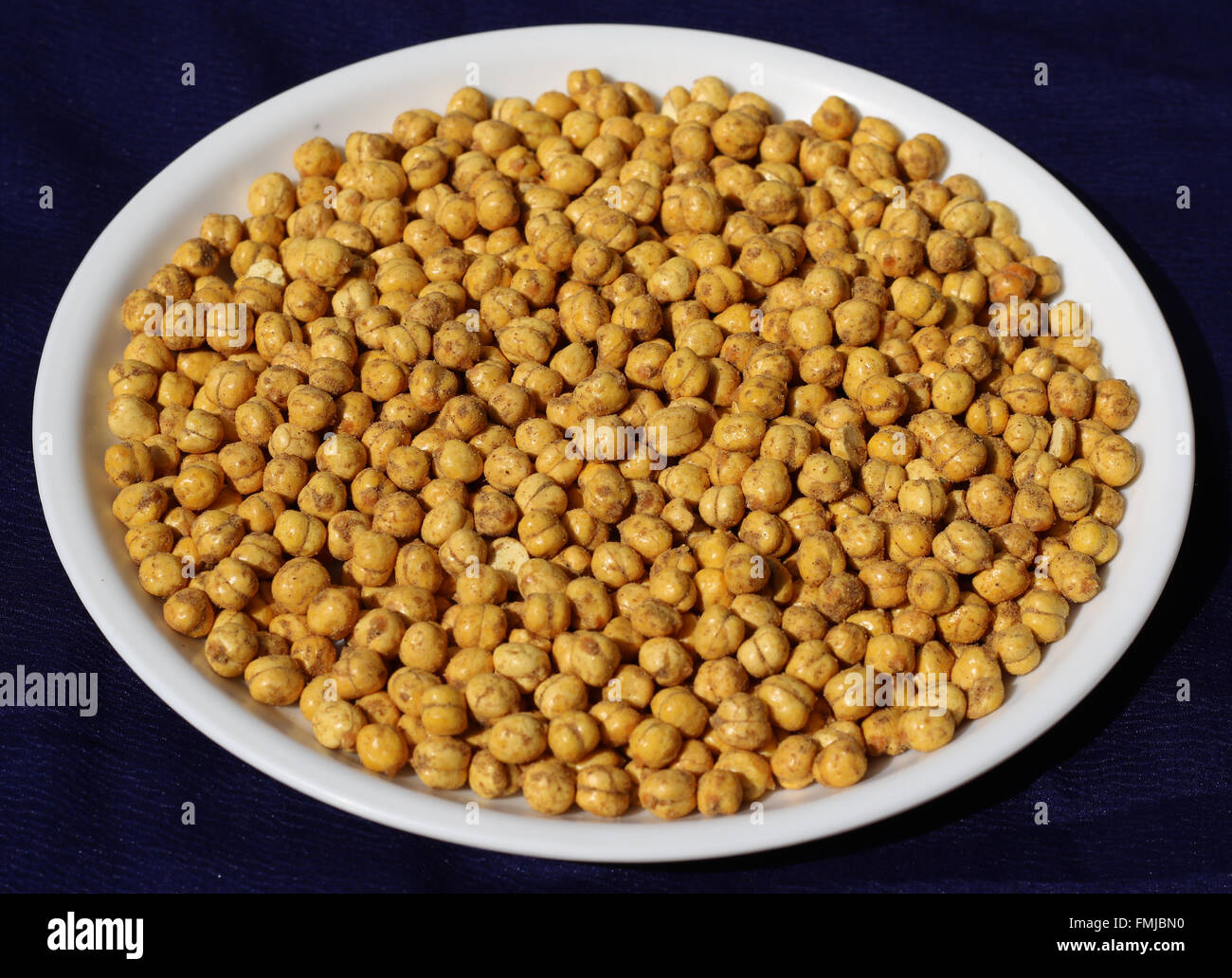 Healthy and tasty roasted chick peas snack Stock Photo - Alamy