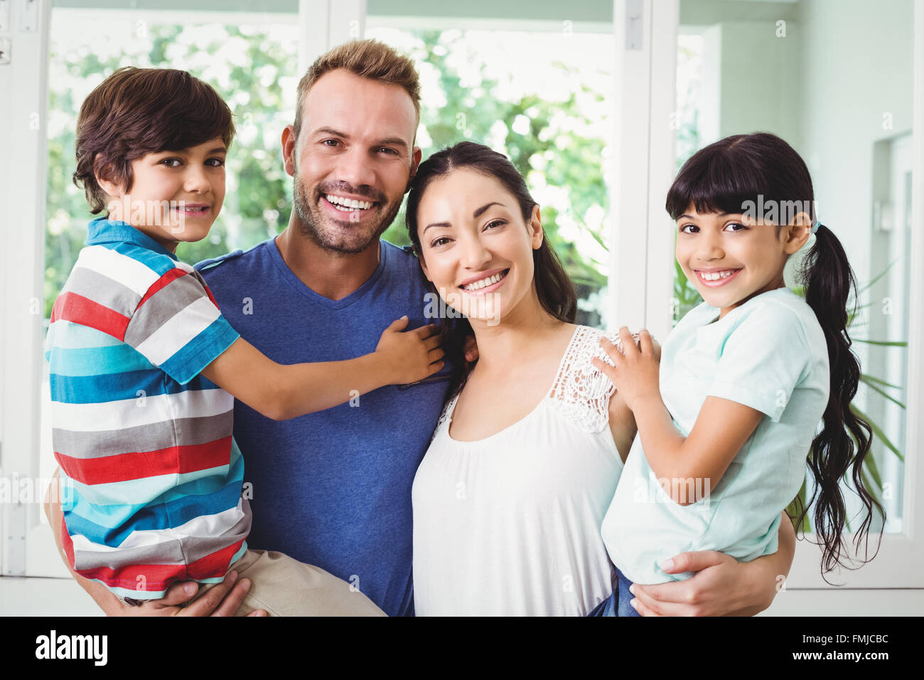 Portrait confident father carrying hi-res stock photography and images ...