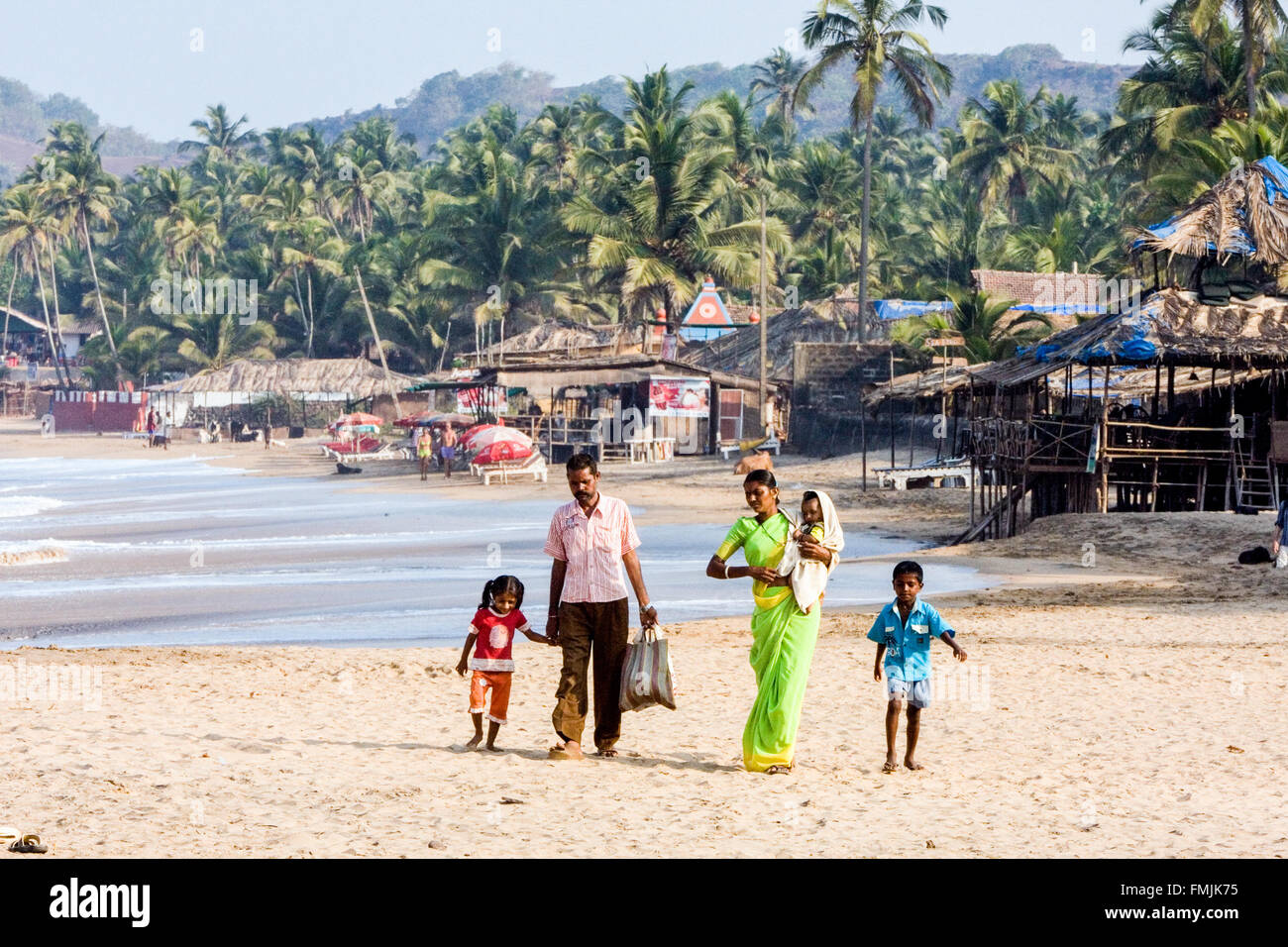 Local Indian family on beach at Anjuna Beach on Anjuna Market day,hippy ...