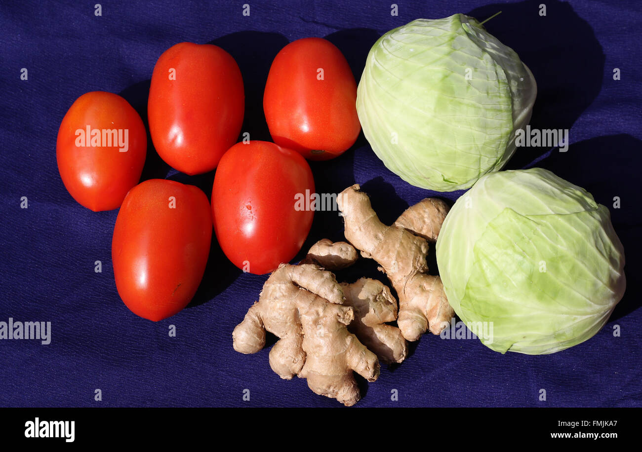 Ginger, cabbage and tomatoes Stock Photo - Alamy