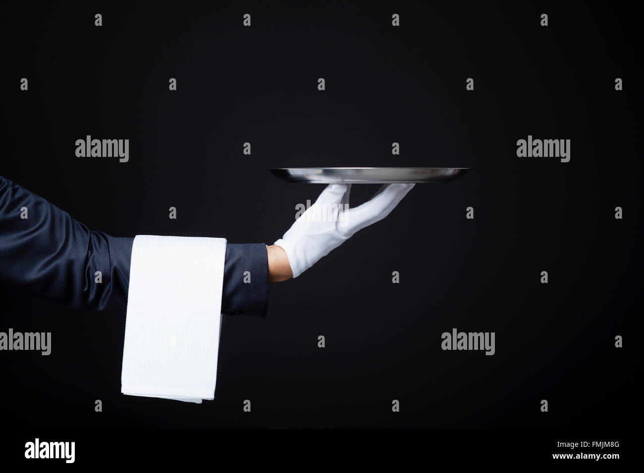 Hand on arm restaurant waiter hi-res stock photography and images - Alamy