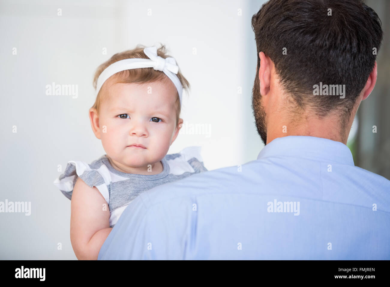 Portrait of cute baby girl with father Stock Photo - Alamy