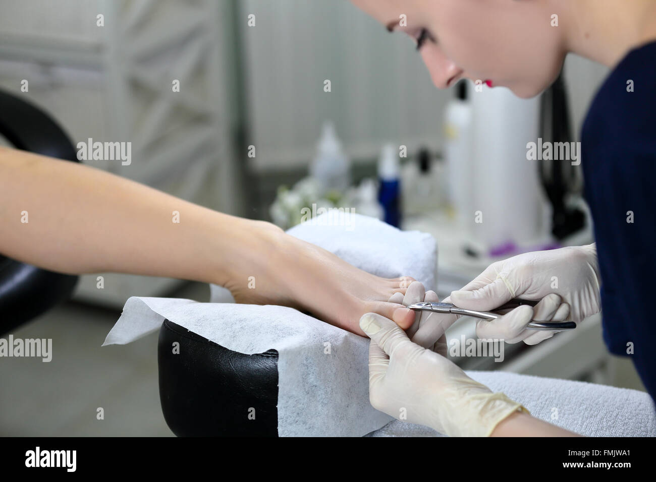 Responsible work pedicure masters Stock Photo - Alamy