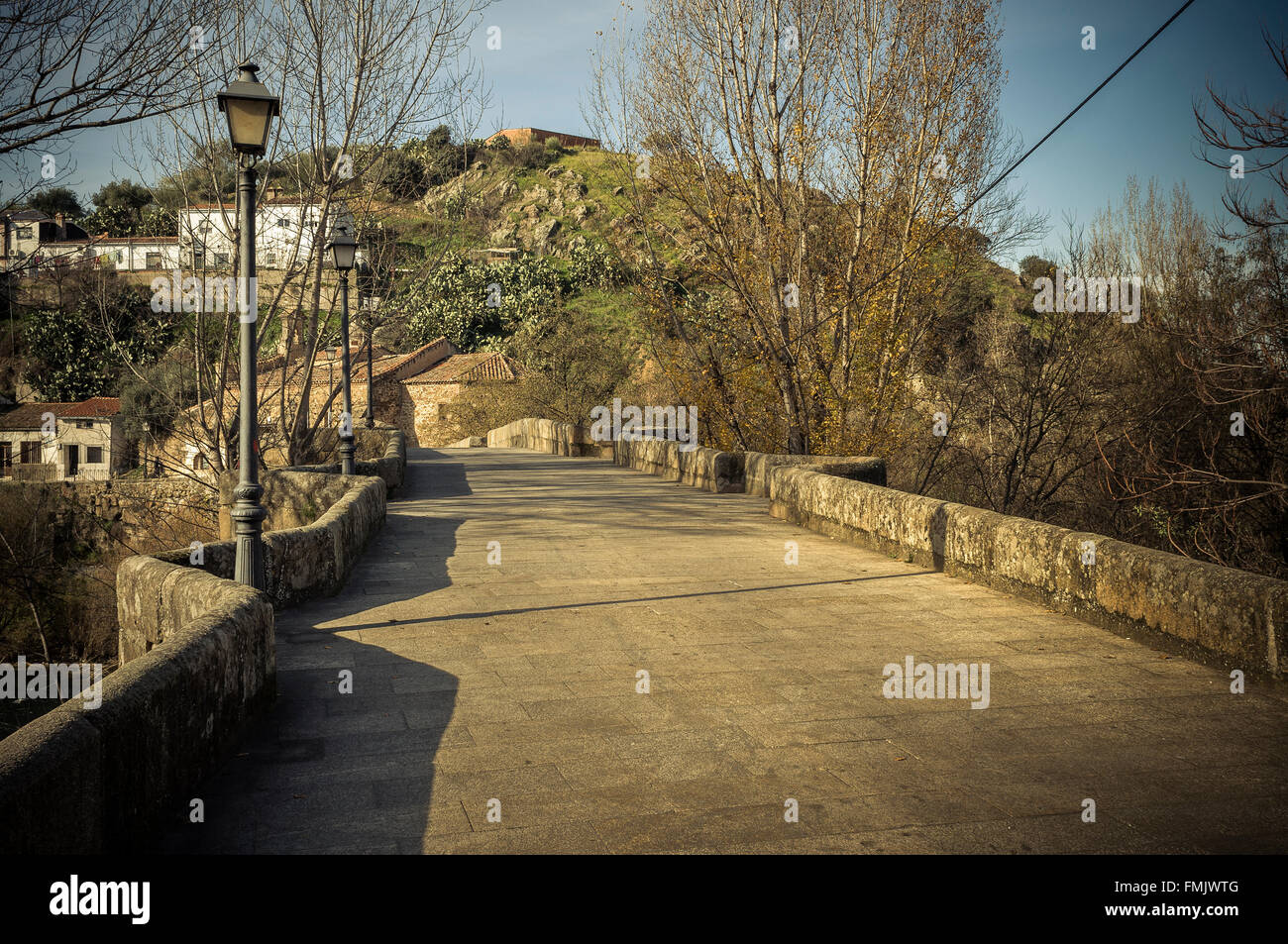 San Lazaro roman bridge that crosses the river Jerte in Plasencia ...