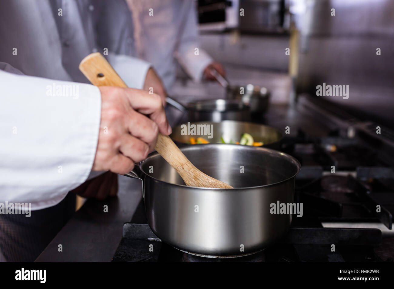 Close-up of chef preparing food Stock Photo - Alamy