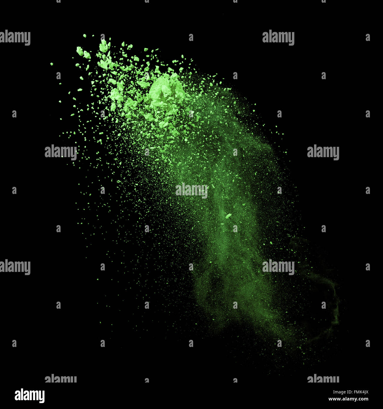 Explosion of green powder on black background Stock Photo - Alamy