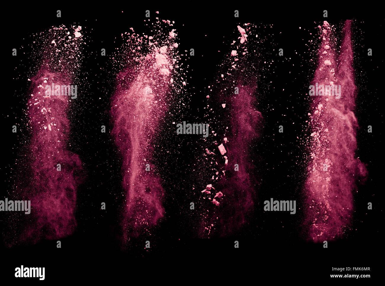 Red powders on black background Stock Photo - Alamy