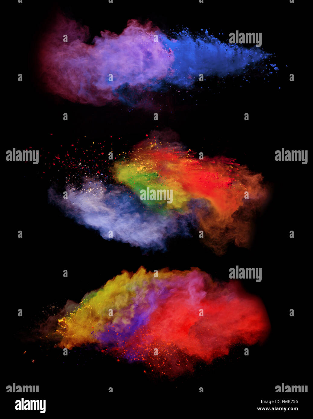 Explosions of colored powder on black background Stock Photo - Alamy