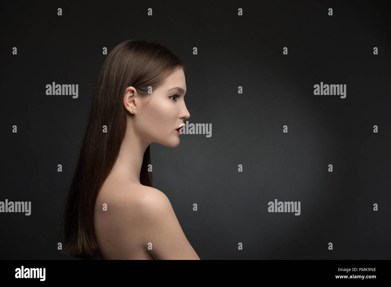 Beauty and fashion model on the black background. Studio portrait Stock ...