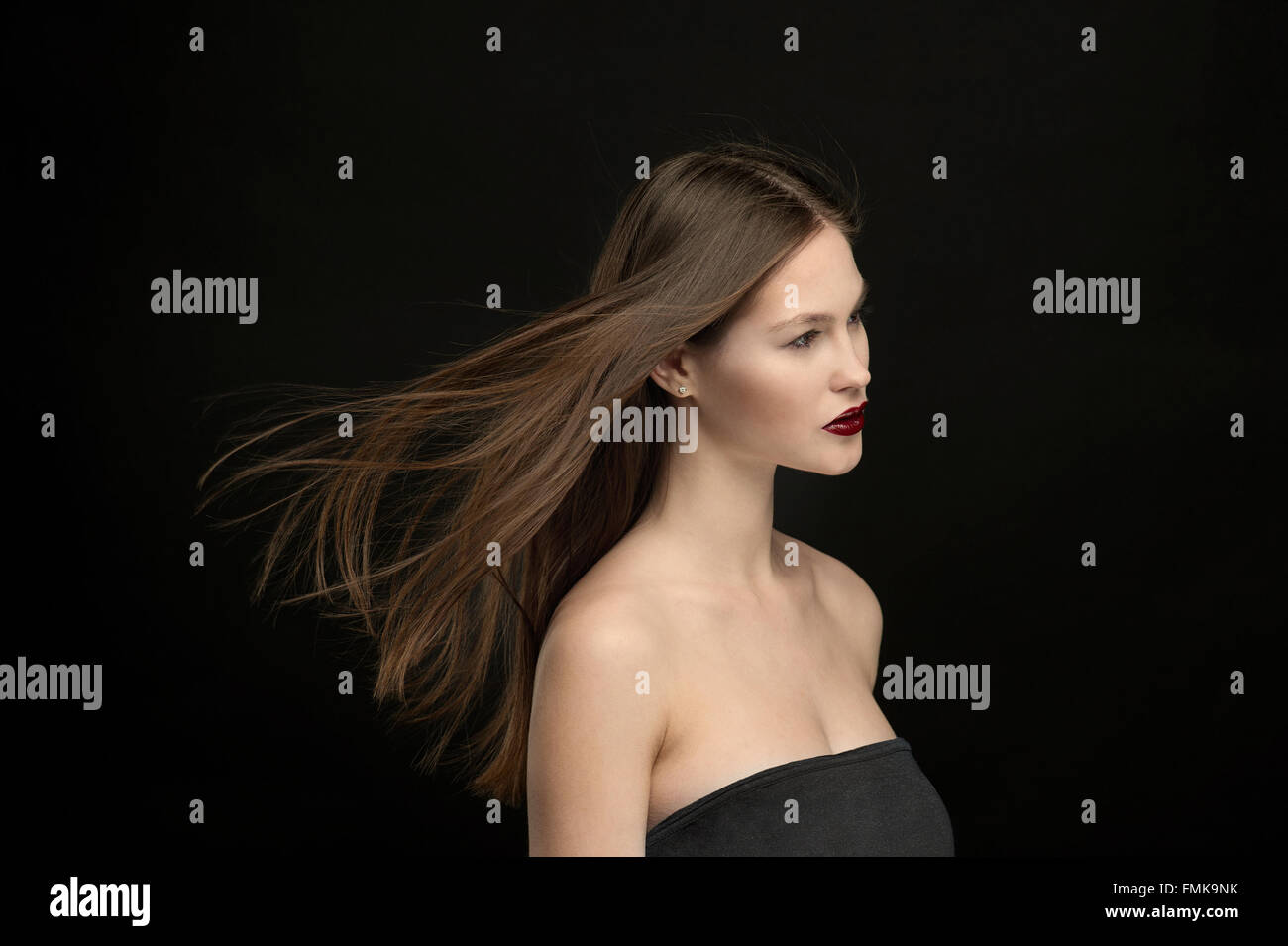 Beauty and fashion model on the black background. Studio portrait Stock ...