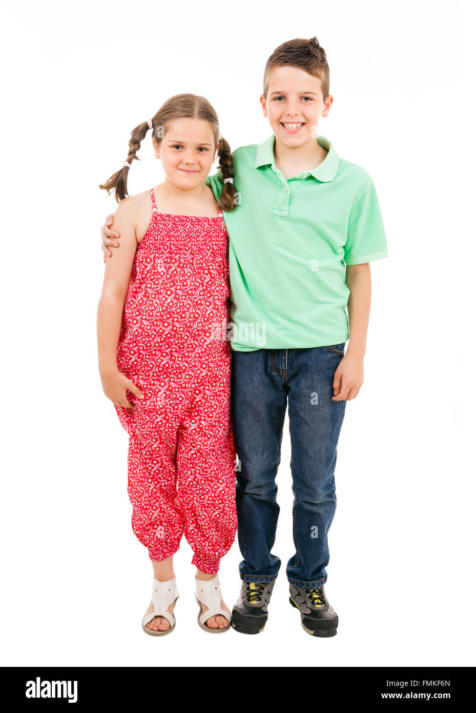 Full body portrait of two children standing over white background Stock ...