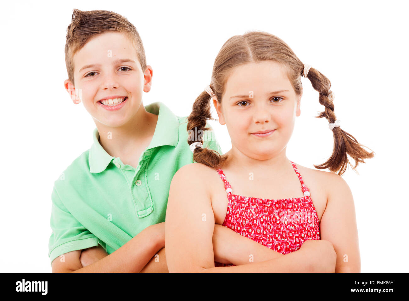 Two children standing over white background Stock Photo - Alamy