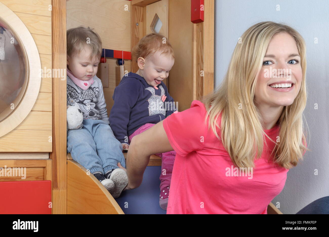 A Women with kids in indoor playground Stock Photo - Alamy
