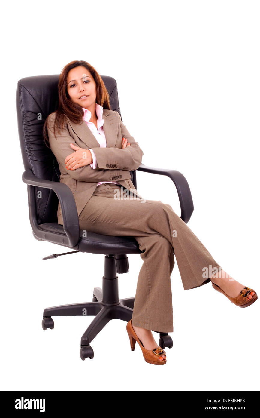 Portrait of beautiful young woman sitting on chair, isolated on white ...