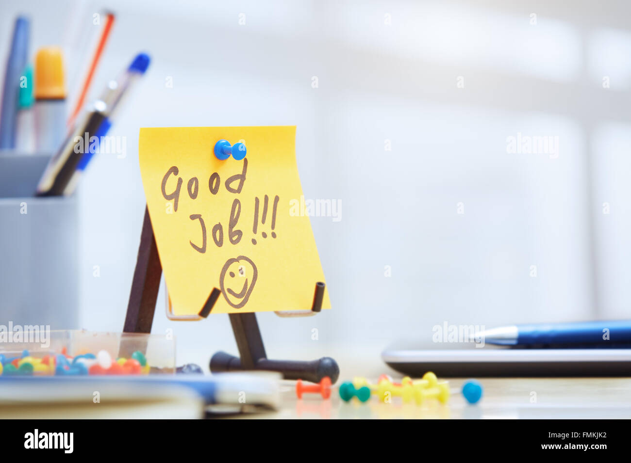 Good job text on adhesive note at office Stock Photo - Alamy