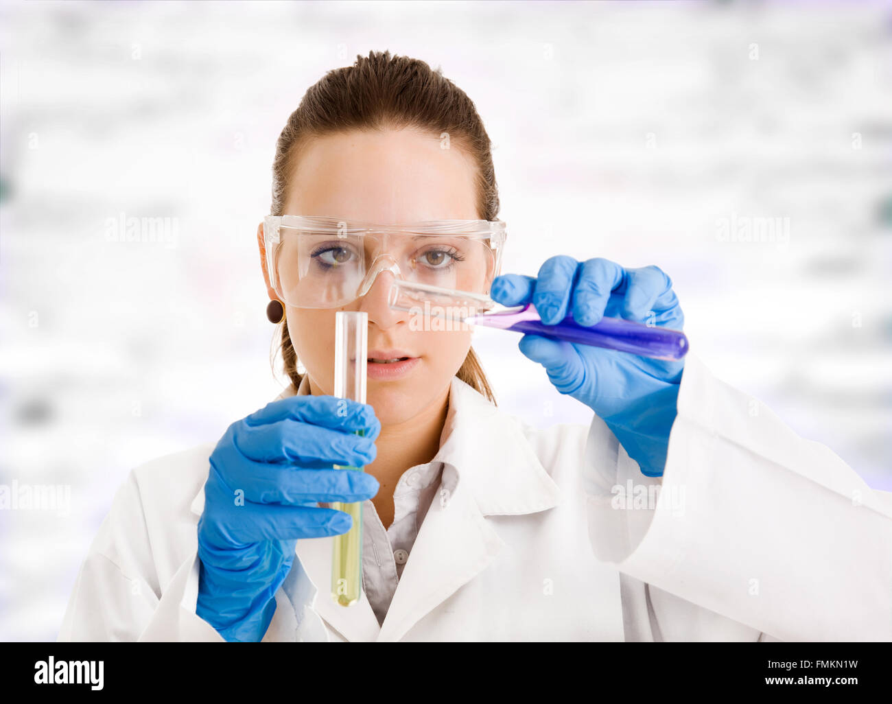 Young female scientist working at the laboratory Stock Photo - Alamy