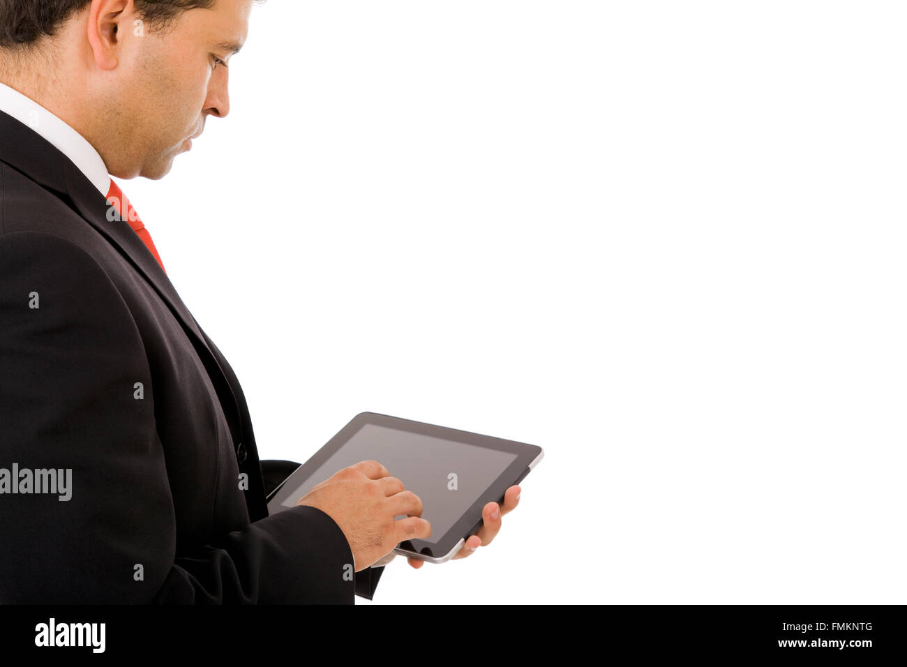 young business man using a touch screen device against white background ...