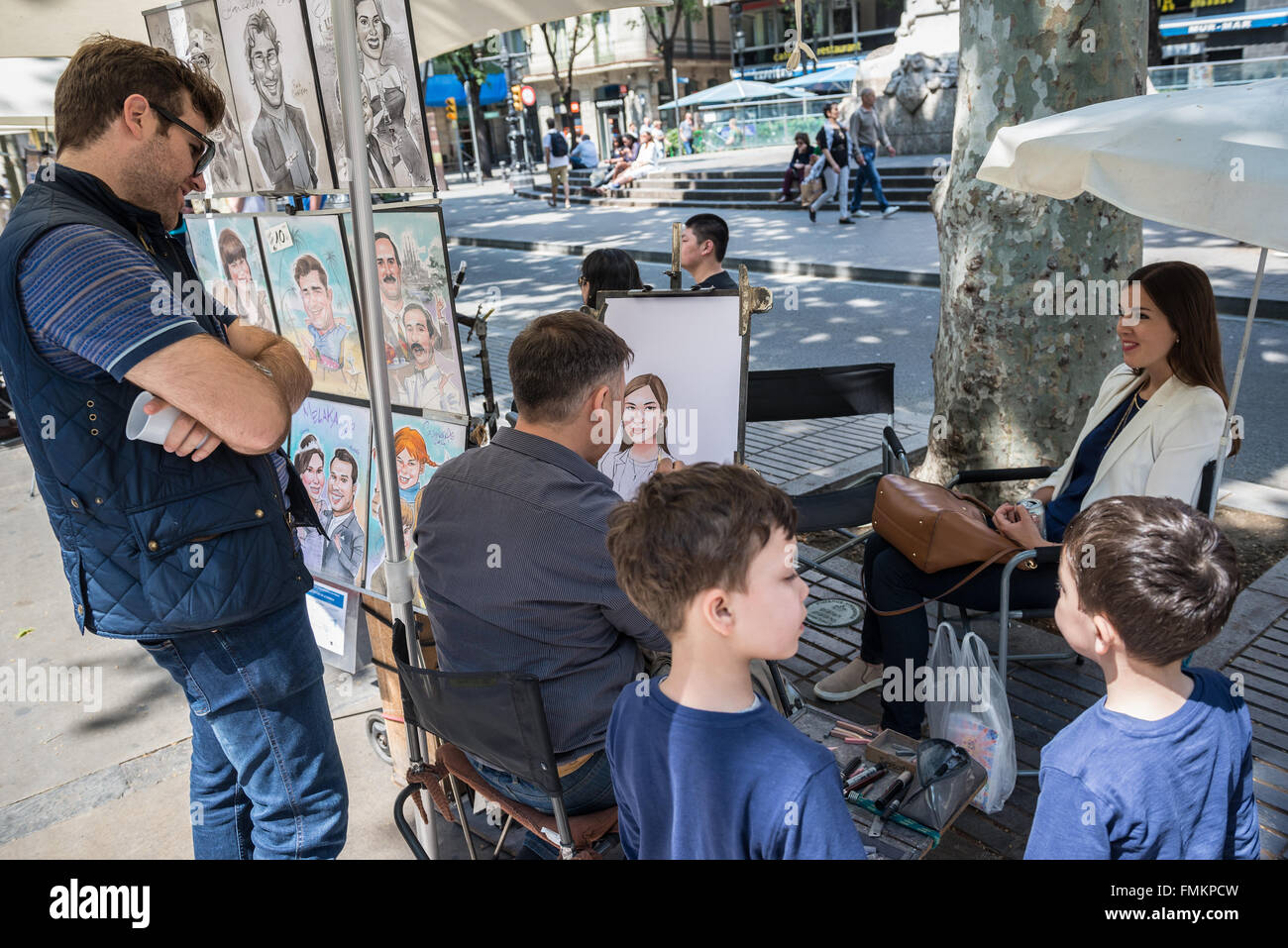 Street caricature painter at La Rambla street in Barcelona, Spain Stock ...