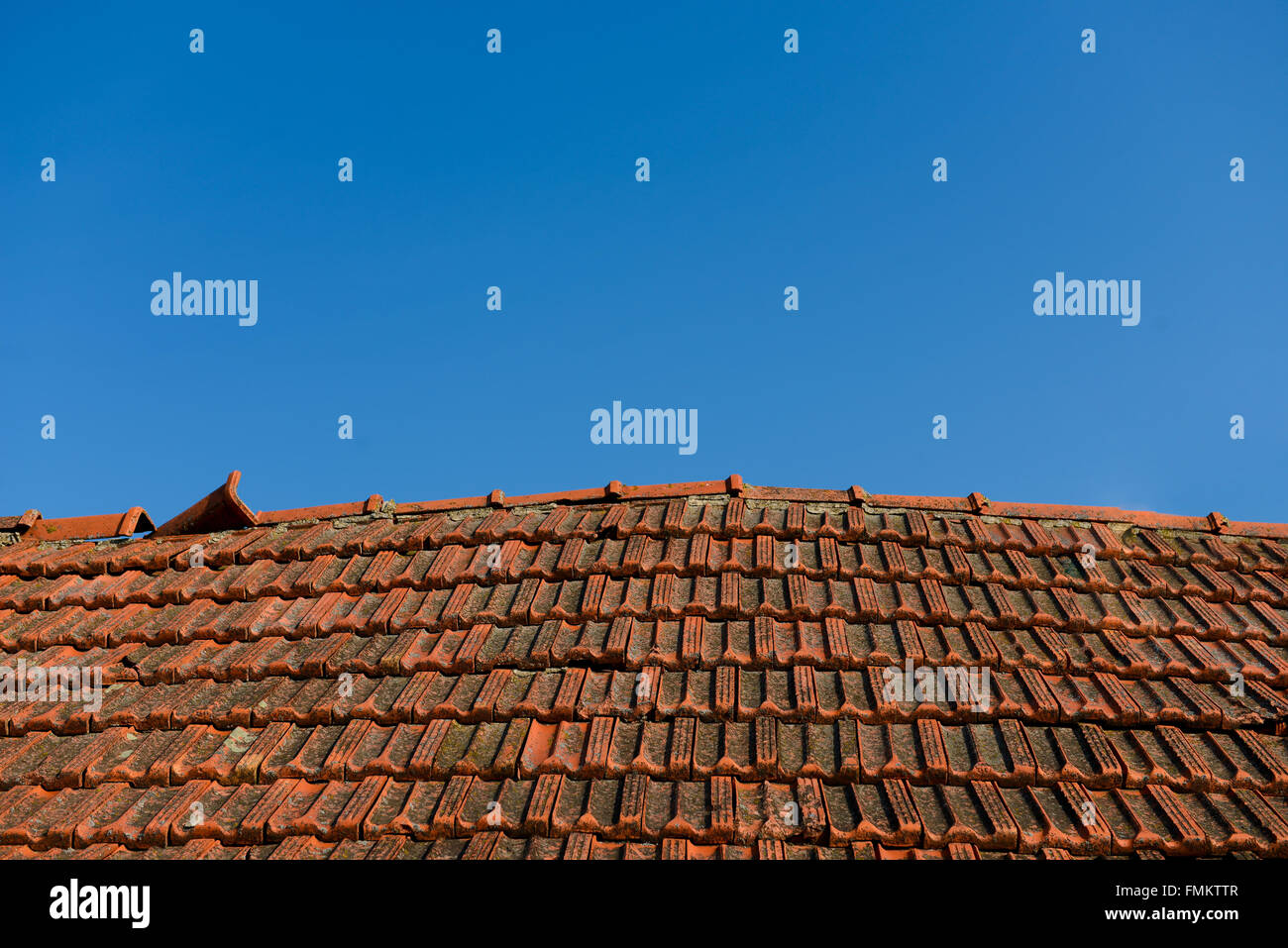 Old ceramic roof with blue sky Stock Photo - Alamy