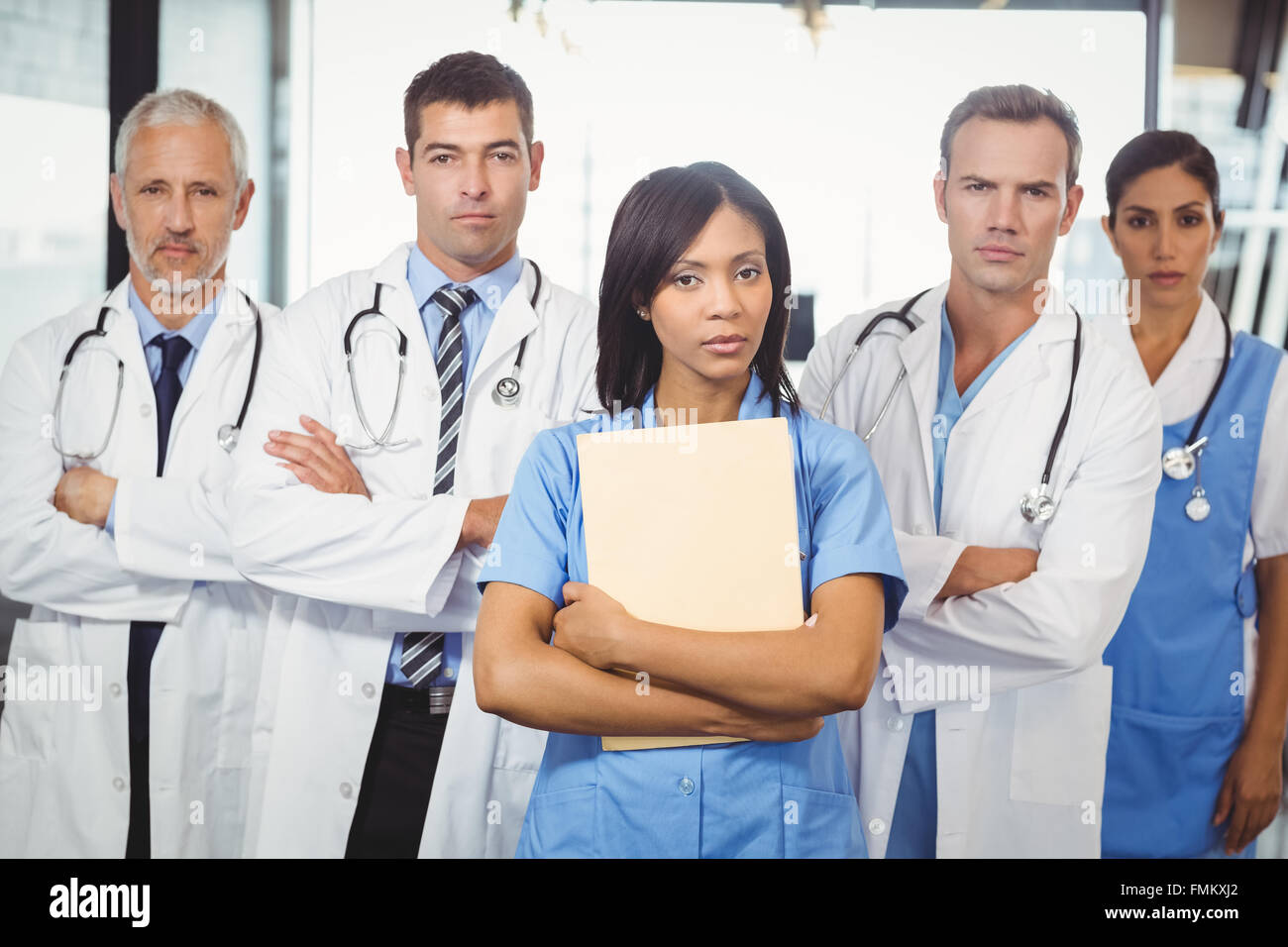 Portrait of medical team standing together Stock Photo - Alamy