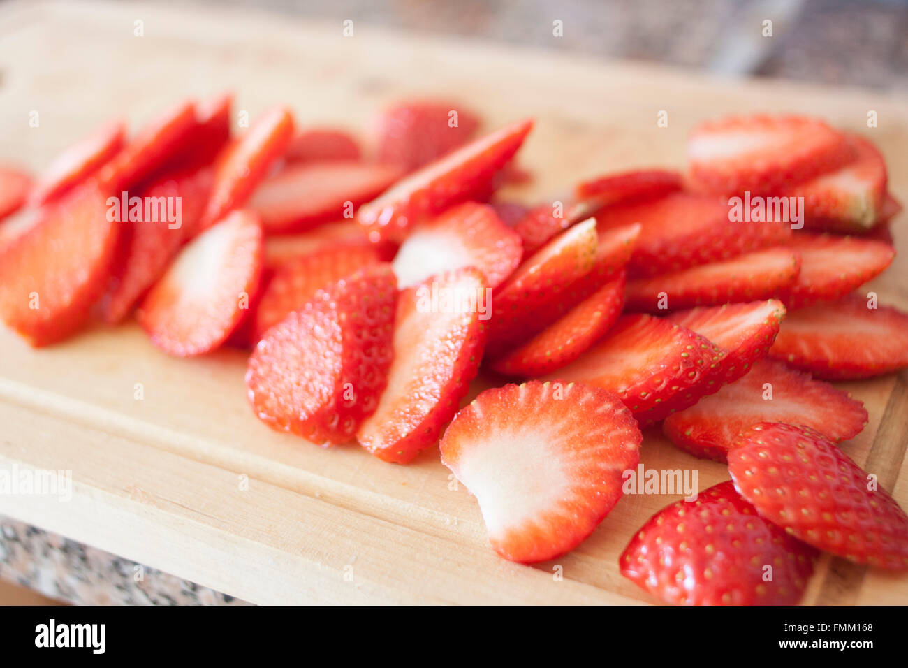Slices of strawberry hi-res stock photography and images - Alamy