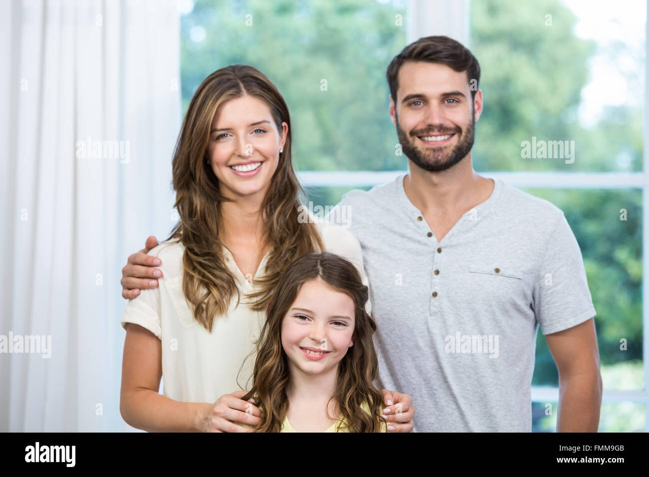 Portrait of smiling family Stock Photo - Alamy