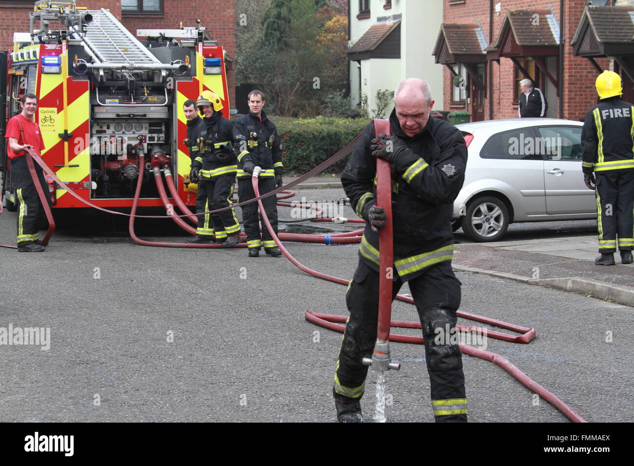Firefighters at the scene of a domestic property fire in Dagenham ...