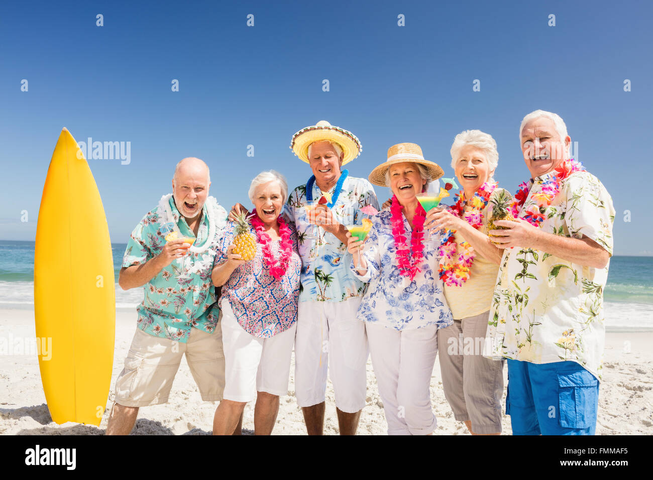 Portrait of smiling senior friends Stock Photo - Alamy