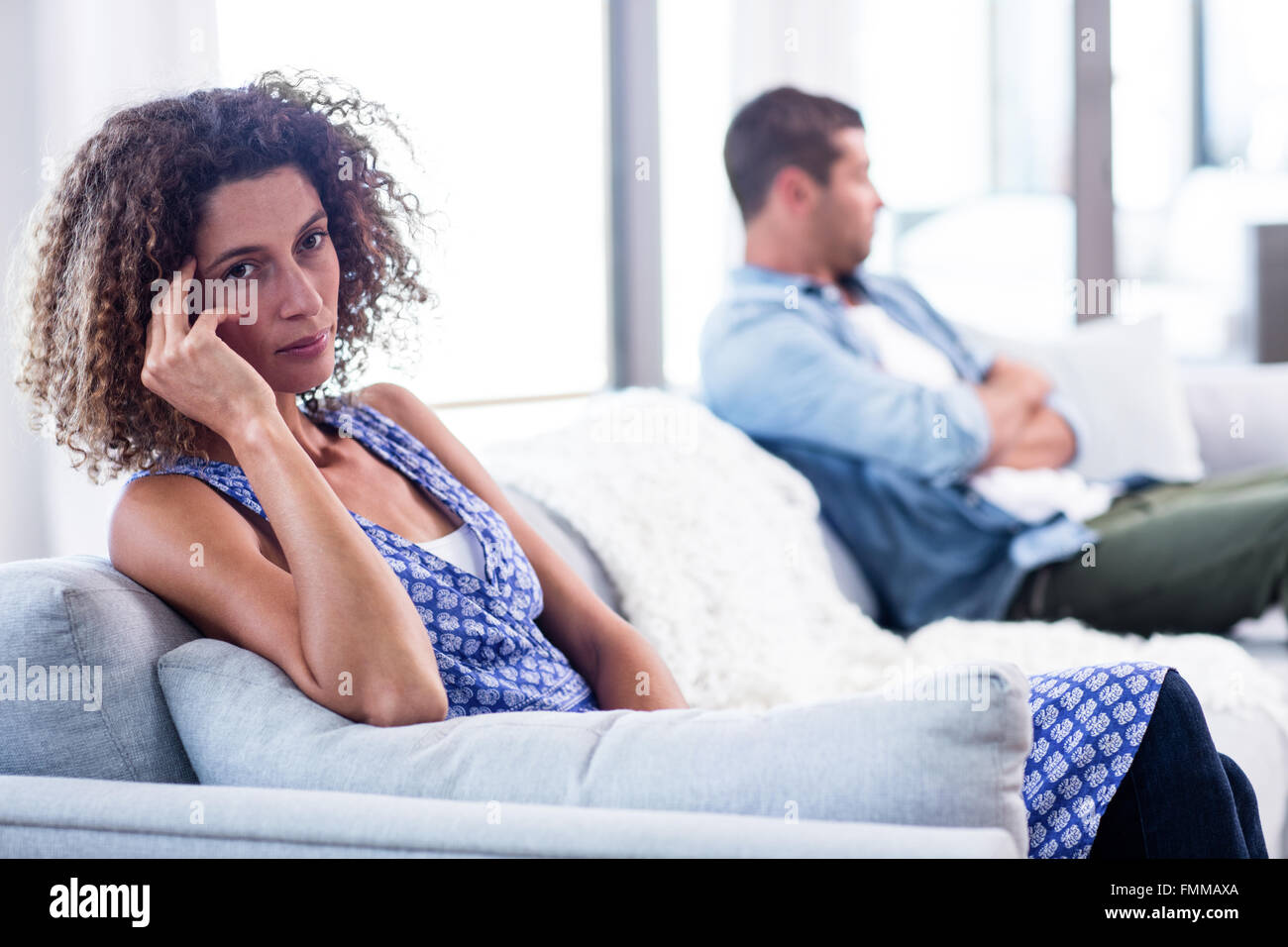 Upset young couple ignoring each other Stock Photo - Alamy