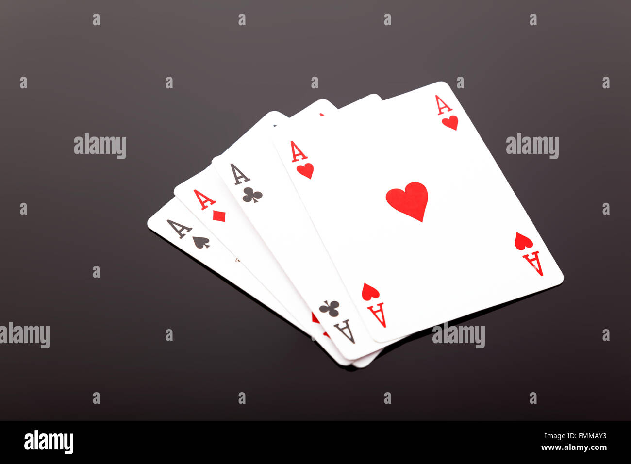 ace poker cards set on black background Stock Photo - Alamy