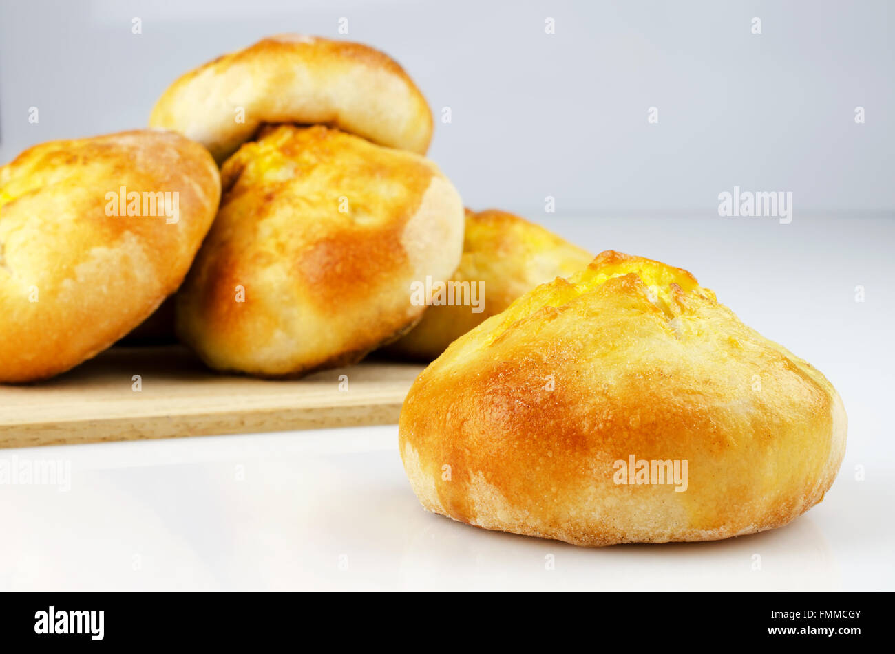 Several baked buns Stock Photo - Alamy