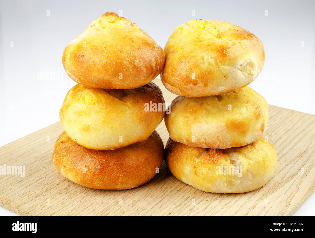 Several baked buns Stock Photo - Alamy