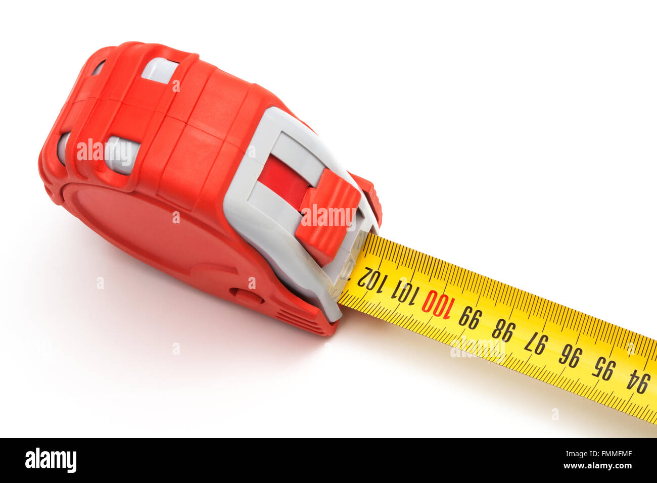 Red new tape-measure on a white background Stock Photo - Alamy