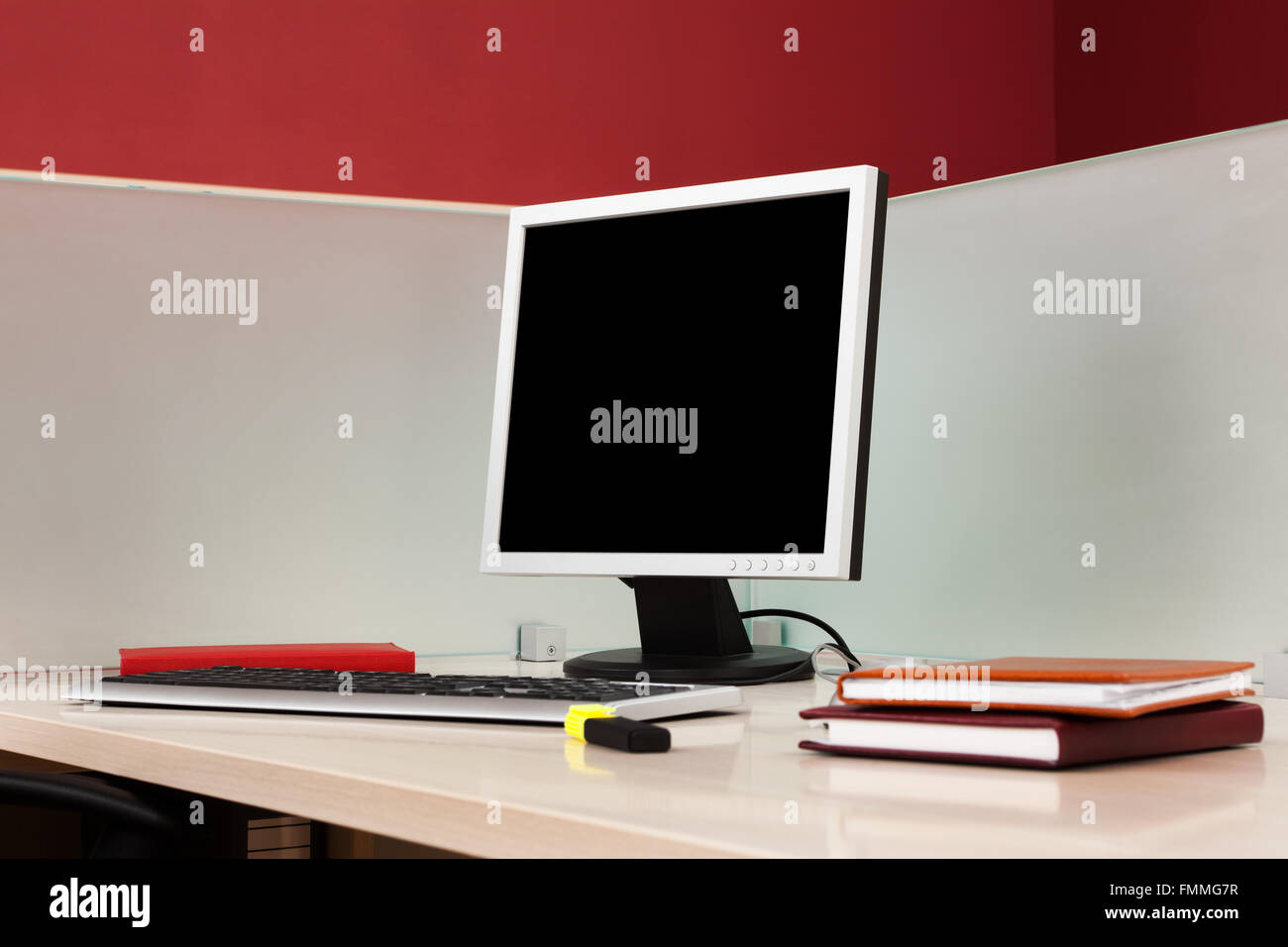 computers behind the glass in a modern office Stock Photo - Alamy