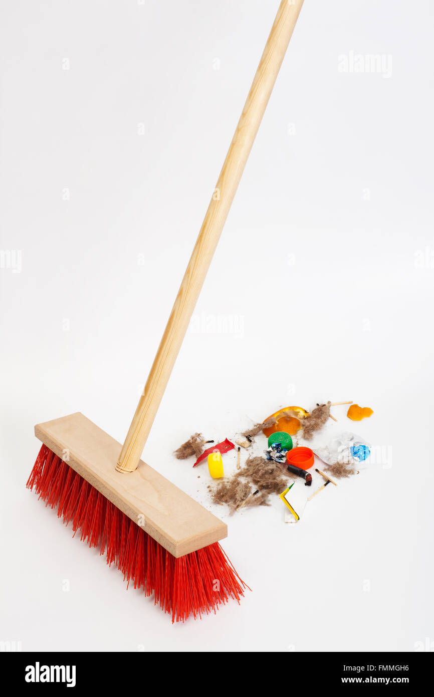 Cleaning the modern red mop mixed trash Stock Photo - Alamy
